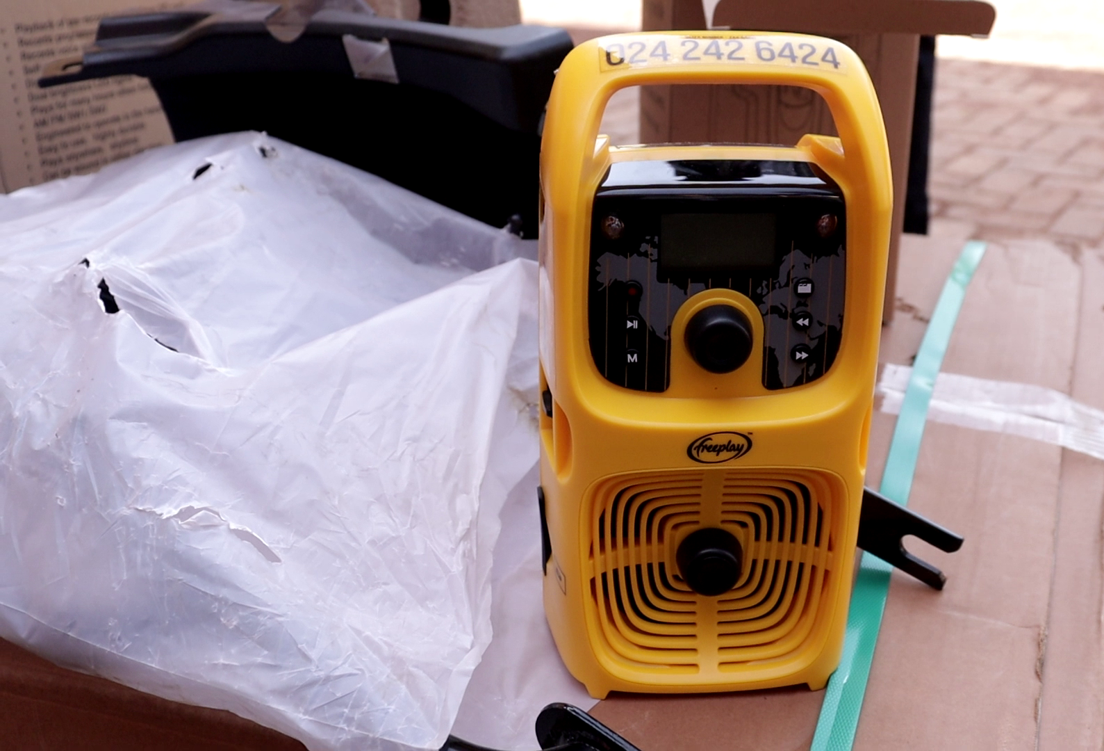 Farm Radio International presents new motor and 10 radio sets to Zaa ...